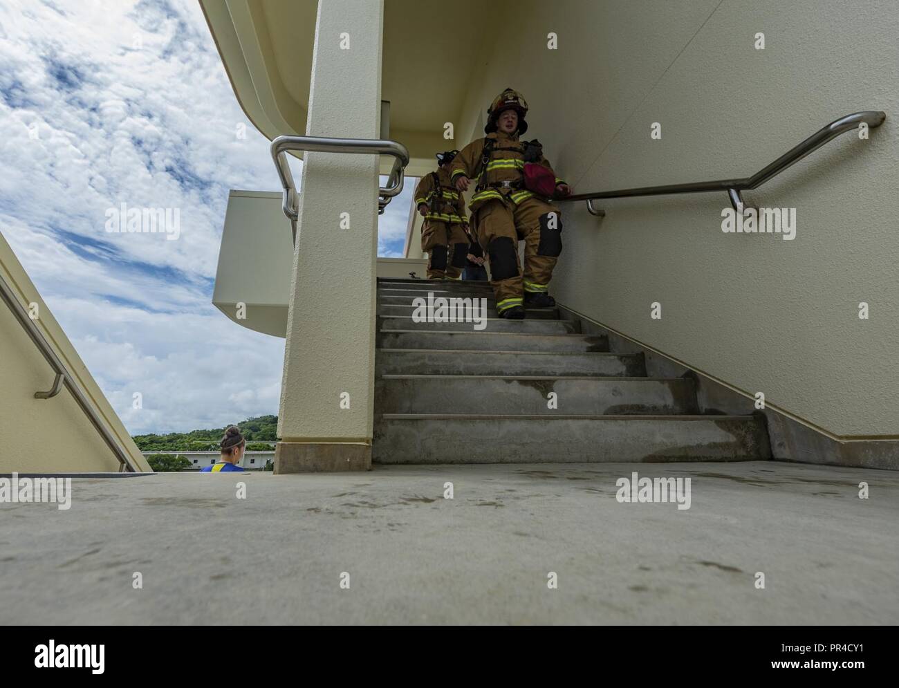 U.S. Air Force Staff Sgt. Nicholas Schafer, right, 18th Civil Engineer ...