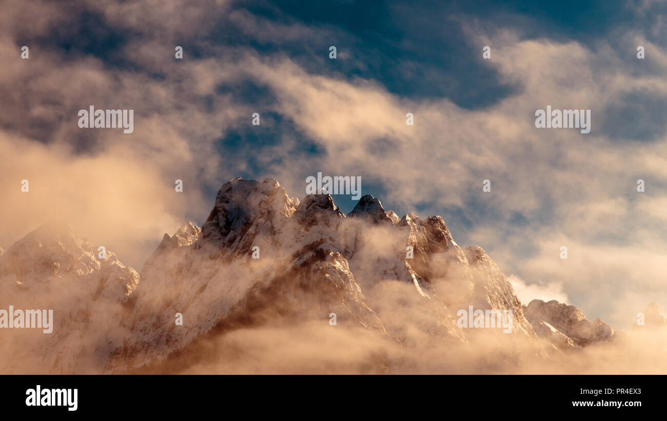 Clouds surrounding the italian alps after the snowfall Stock Photo - Alamy