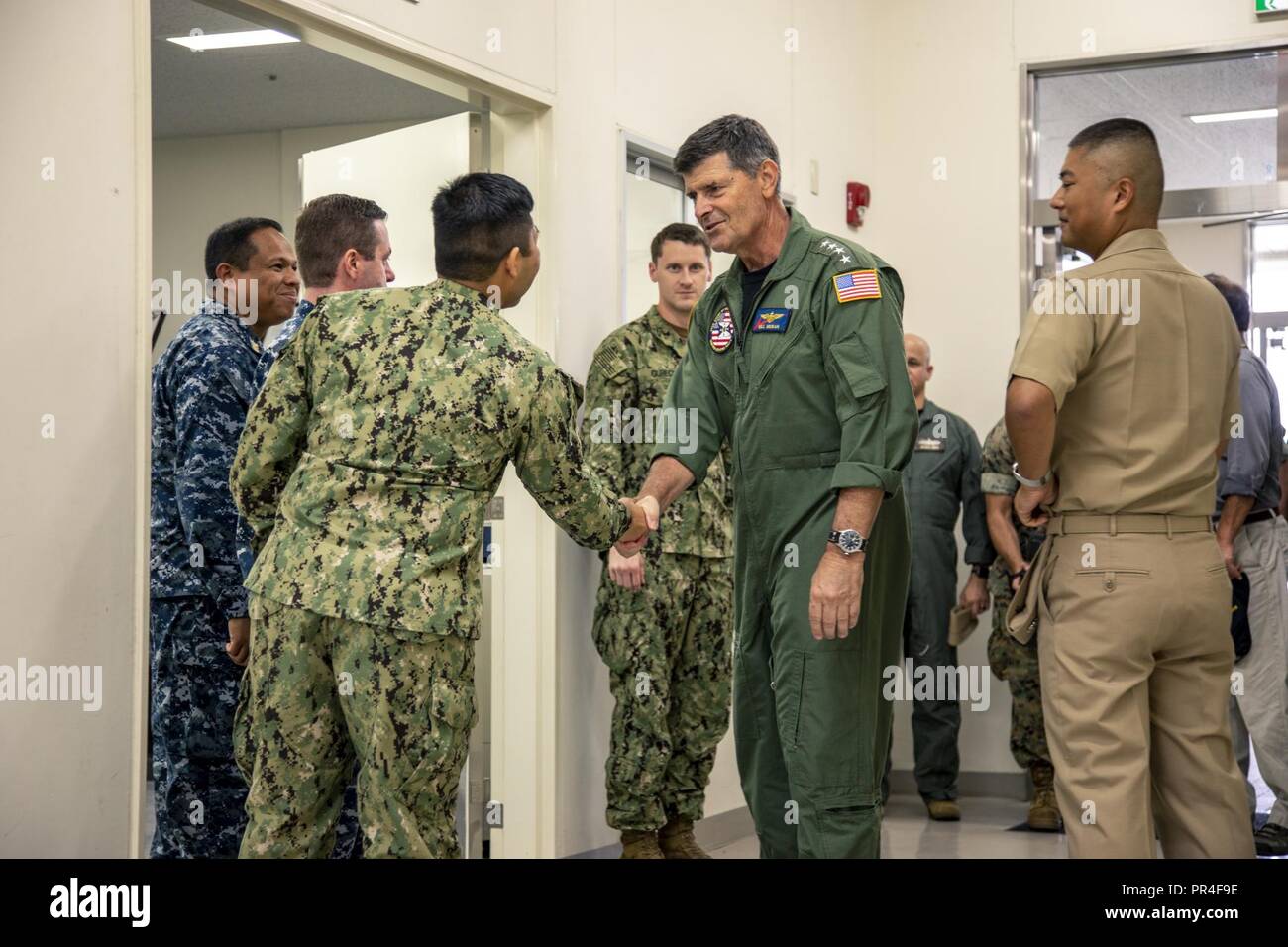 U.S. Navy Adm. William Moran, vice chief of naval operations, center ...