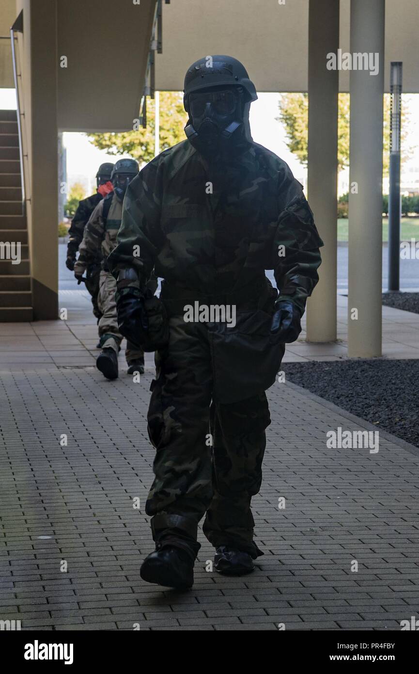 U.S. Air Force Airmen arrive at the medical clinic after conducting a ...