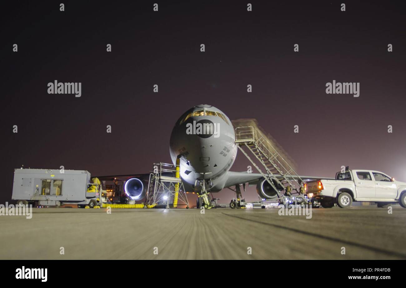 Crew chiefs prepare a KC-10 Extender from the 380th Air Expeditionary ...