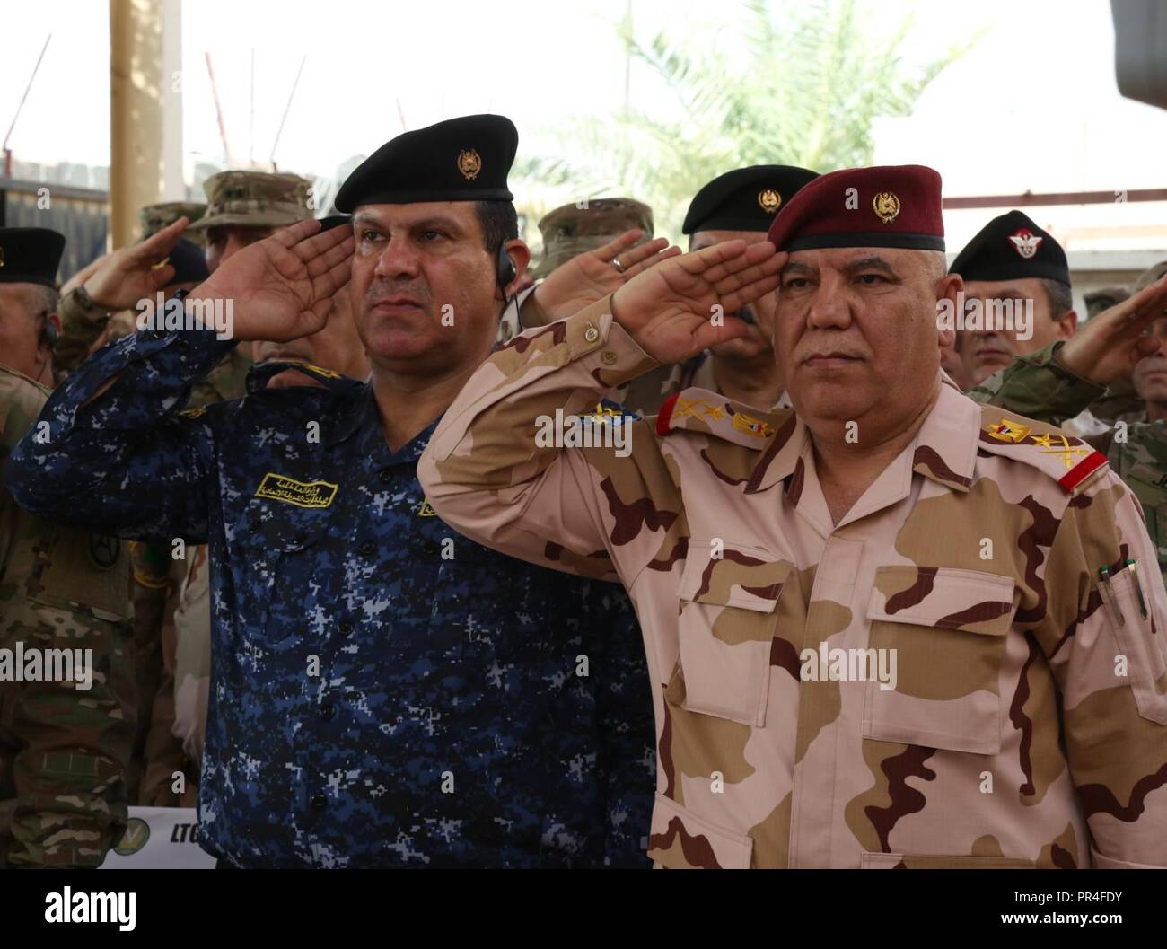 Members of the Iraqi Security Forces present arms during the Combined ...