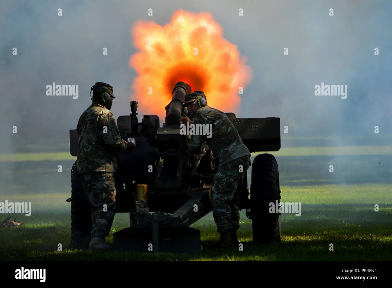 Soldiers fire a 21-gun salute at Rock Island Arsenal, Sept. 11, in ...