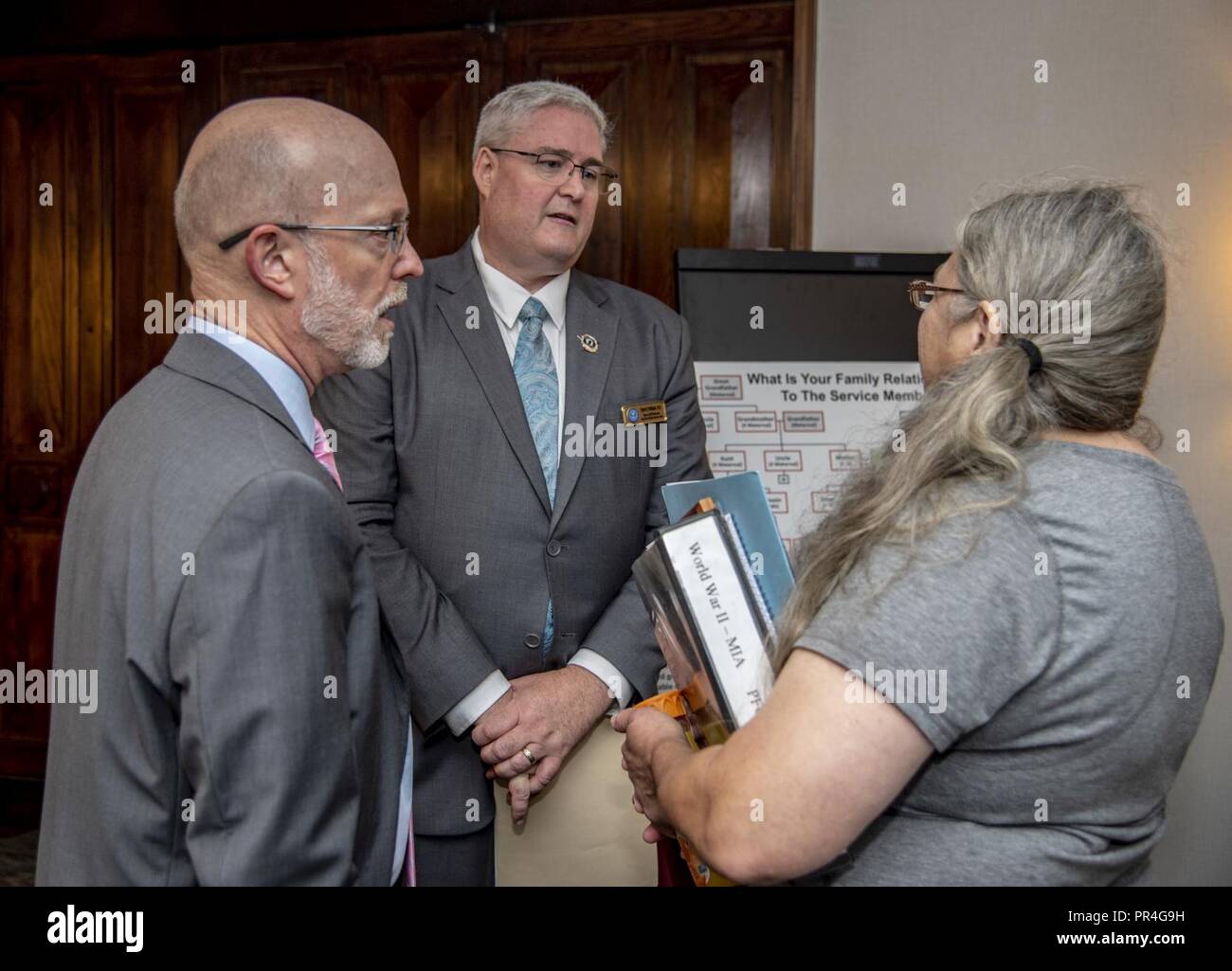 Dr. Timothy McMahon (middle), Armed Forces Medical Examienr System ...
