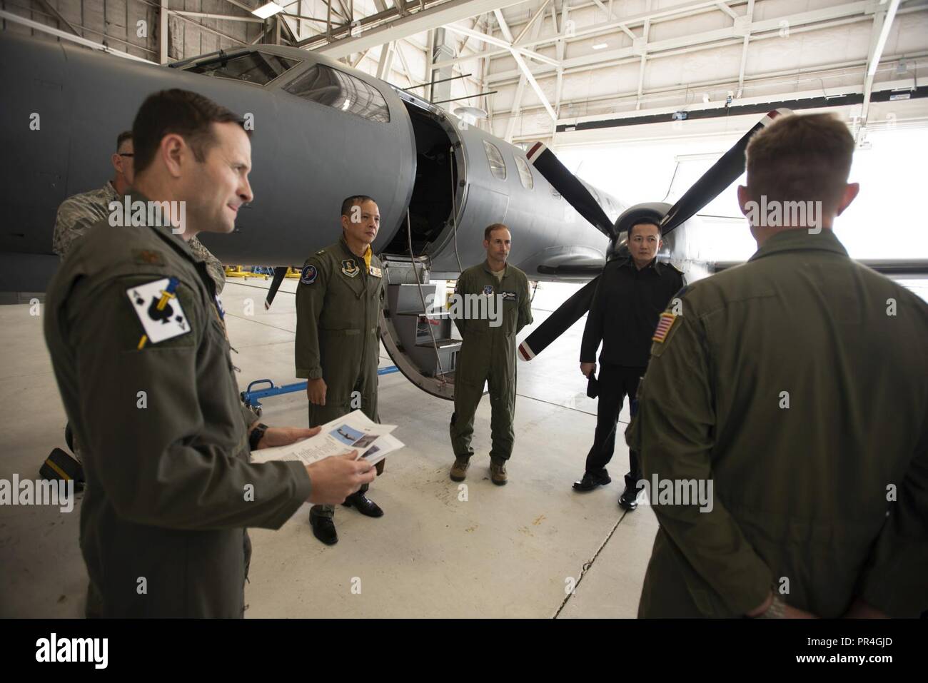 Maj. Zach Wagner (L), RC-26 program, briefs Royal Thai Air Force ...