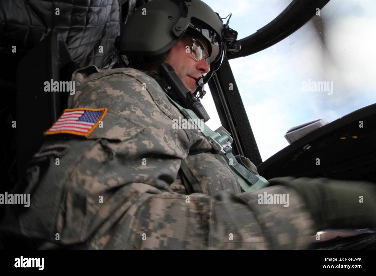 Chief Warrant Officer 4 Pat Donohue mans the controls of his CH-47 ...