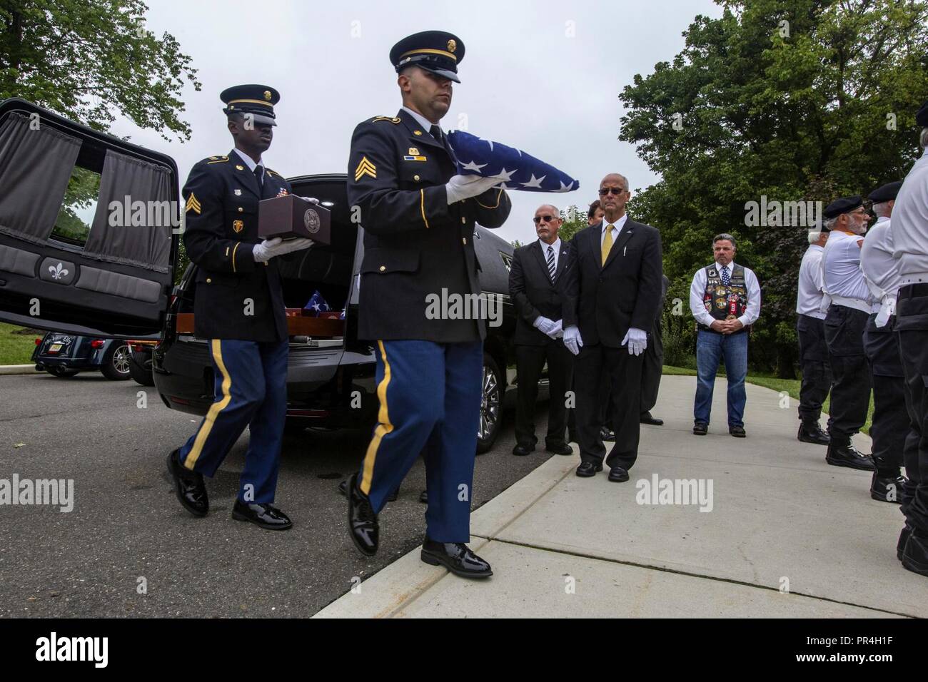U.S. Army Sgts. Mike DeMayo, front, and Raheem Rowell, both with the ...