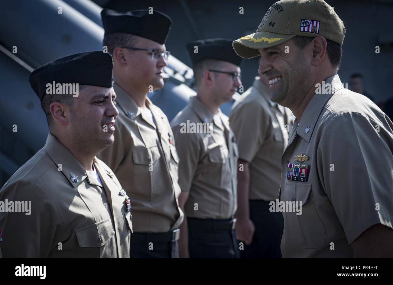 SEA (Sept. 13, 2018) Cmdr. Tyson Young, commanding officer of the ...