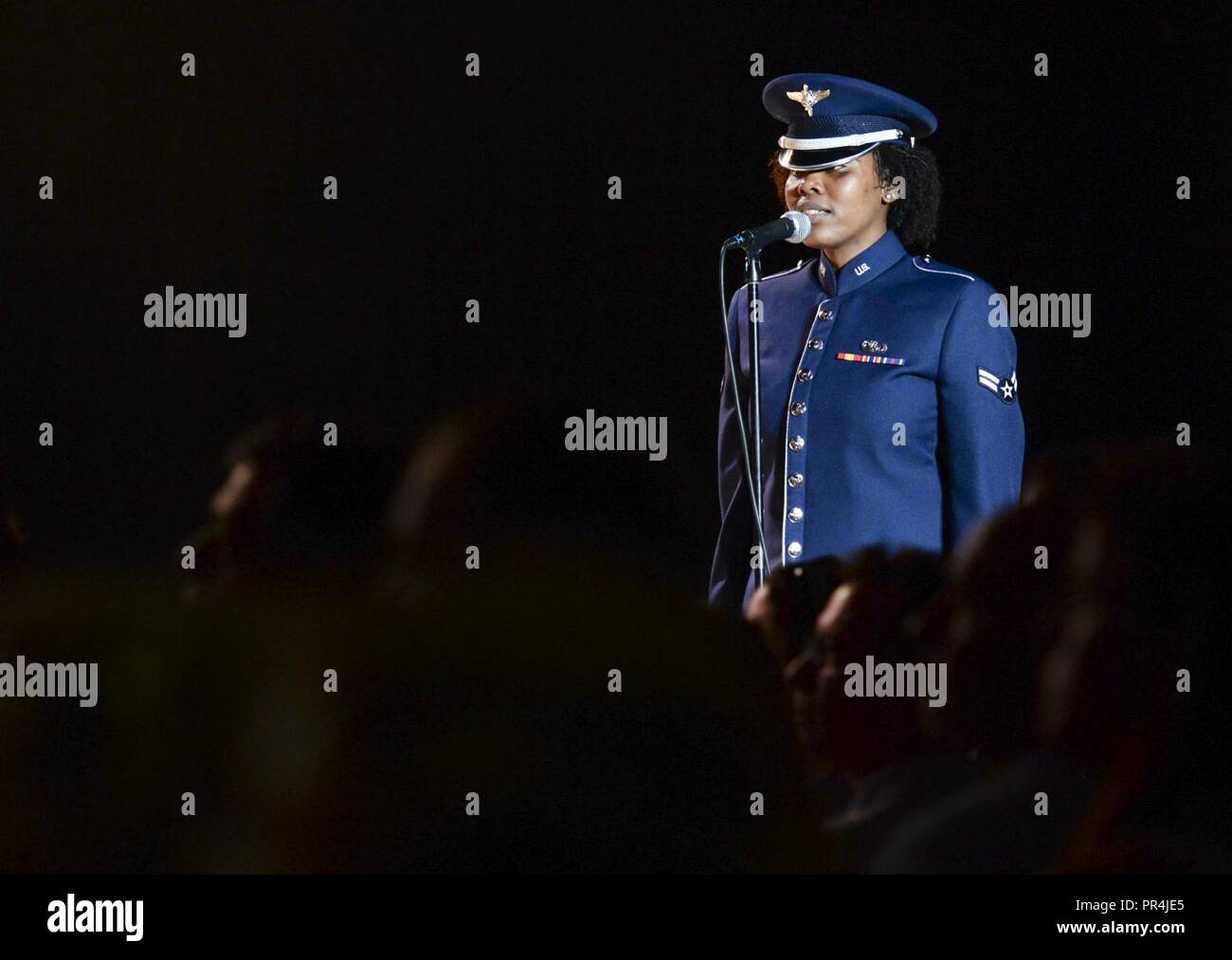 Airman 1st Class MeLan Smartt, Air Force Band of Flight vocalist, sings ...