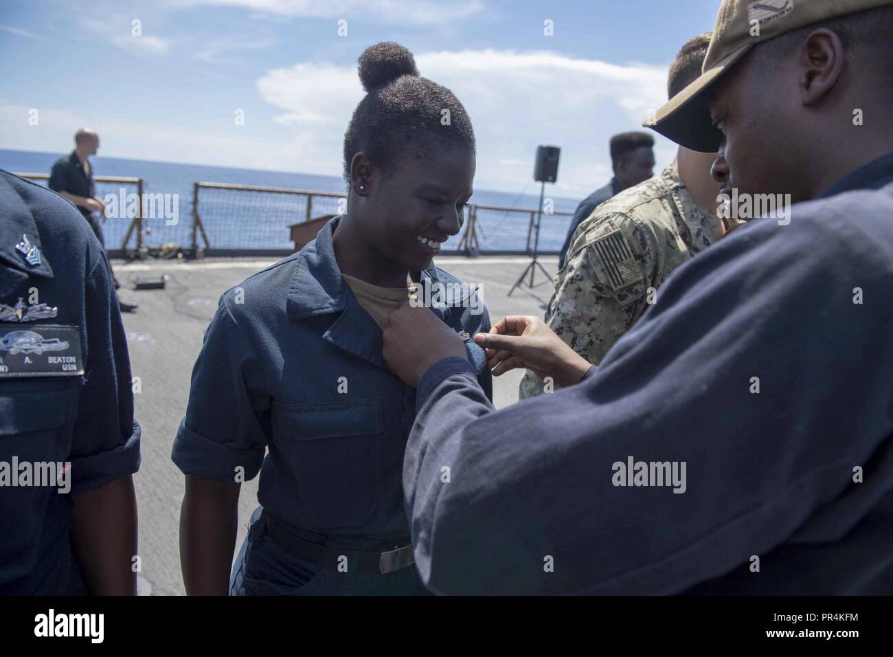 ATLANTIC OCEAN (Sep. 14, 2018) Seaman Lydia Dailey is awarded the ...
