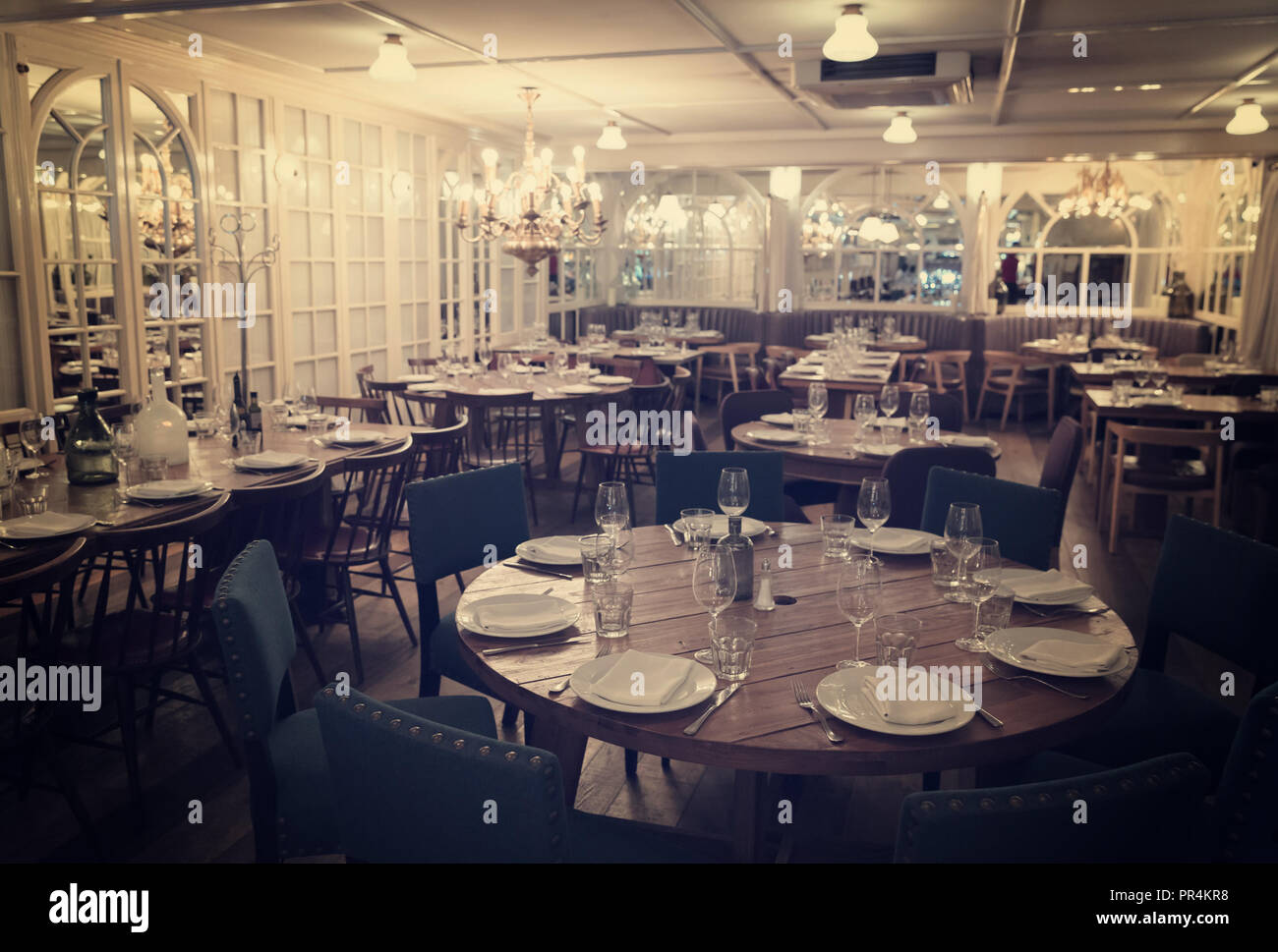 Empty hall on stylish restaurant with serving wooden tables Stock Photo ...