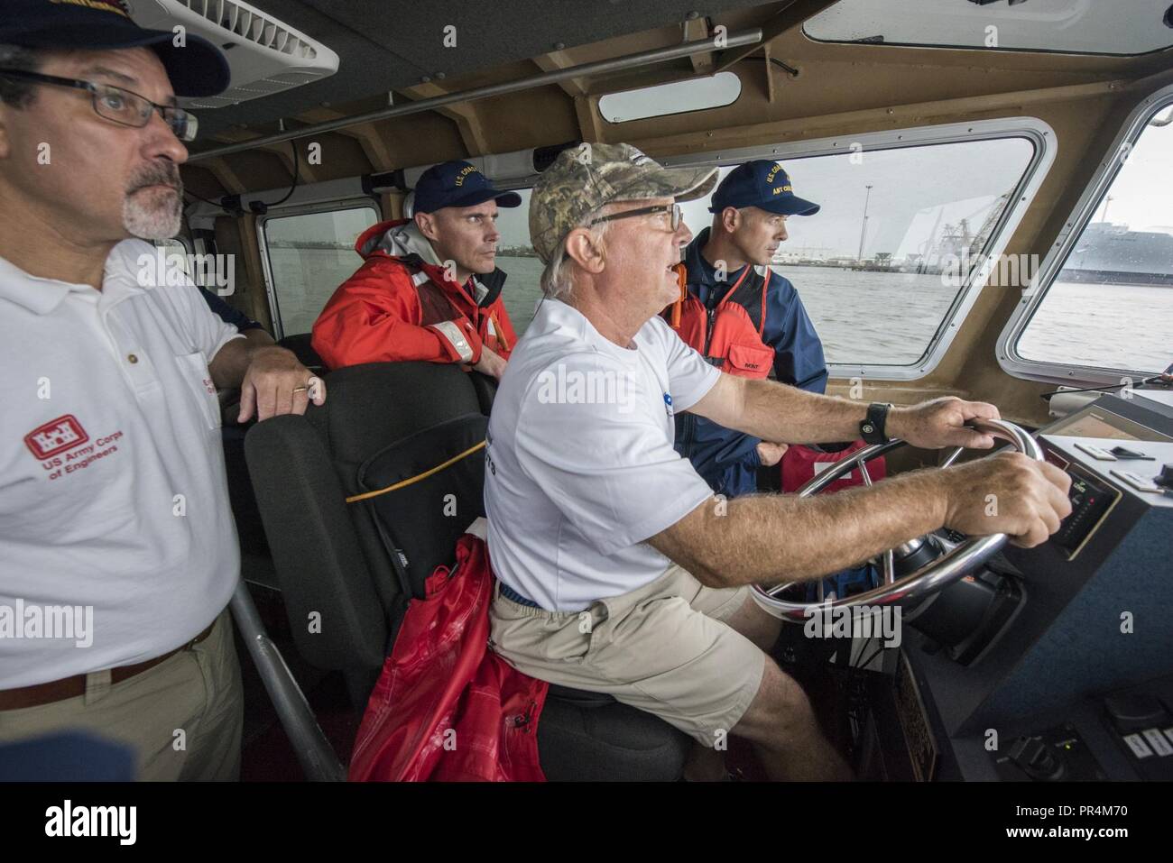 Coast Guard Chief Warrant Officer Richard Keefauver, left, Sector ...