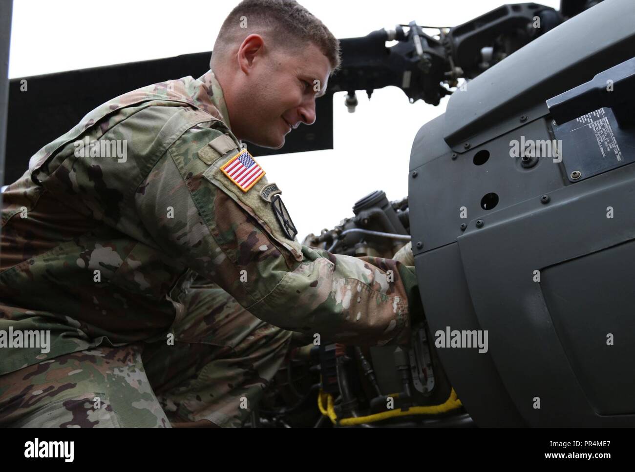 U.S. Army Reserve Sgt. William Lagrave, a CH-47 Chinook helicopter ...