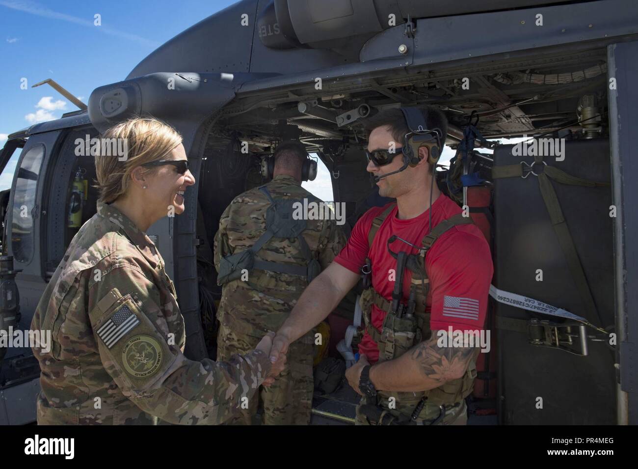 Col. Jennifer Short, 23d Wing commander, left, bids farewell to an ...