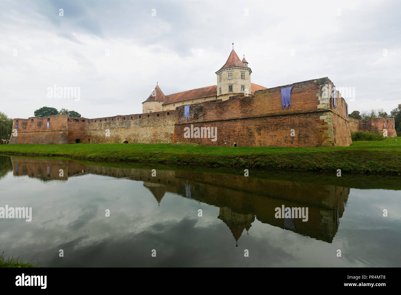 Castle on the lake is landmark of Fagaras in Romania Stock Photo - Alamy