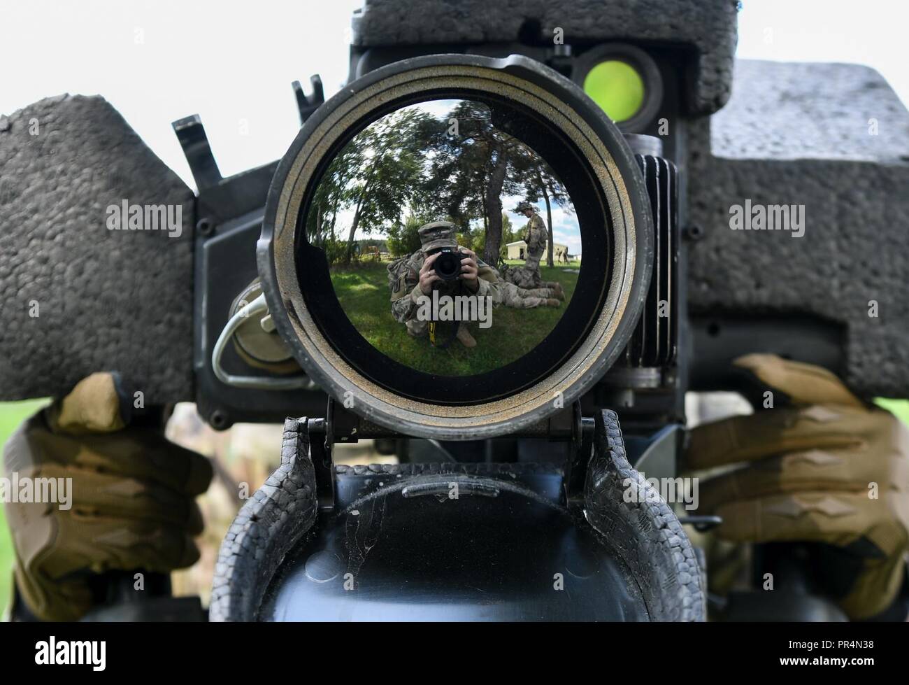 Sky Soldier scouts from Blue Platoon, Anvil Troop, 1-91 CAV utilize the ...