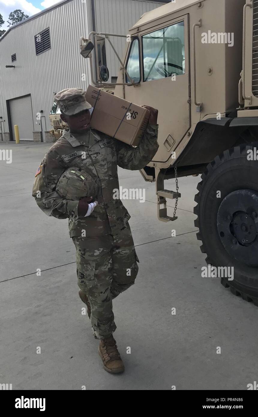 Pfc. Jamal Hart, a motor transport operator with 396th Composite Truck ...