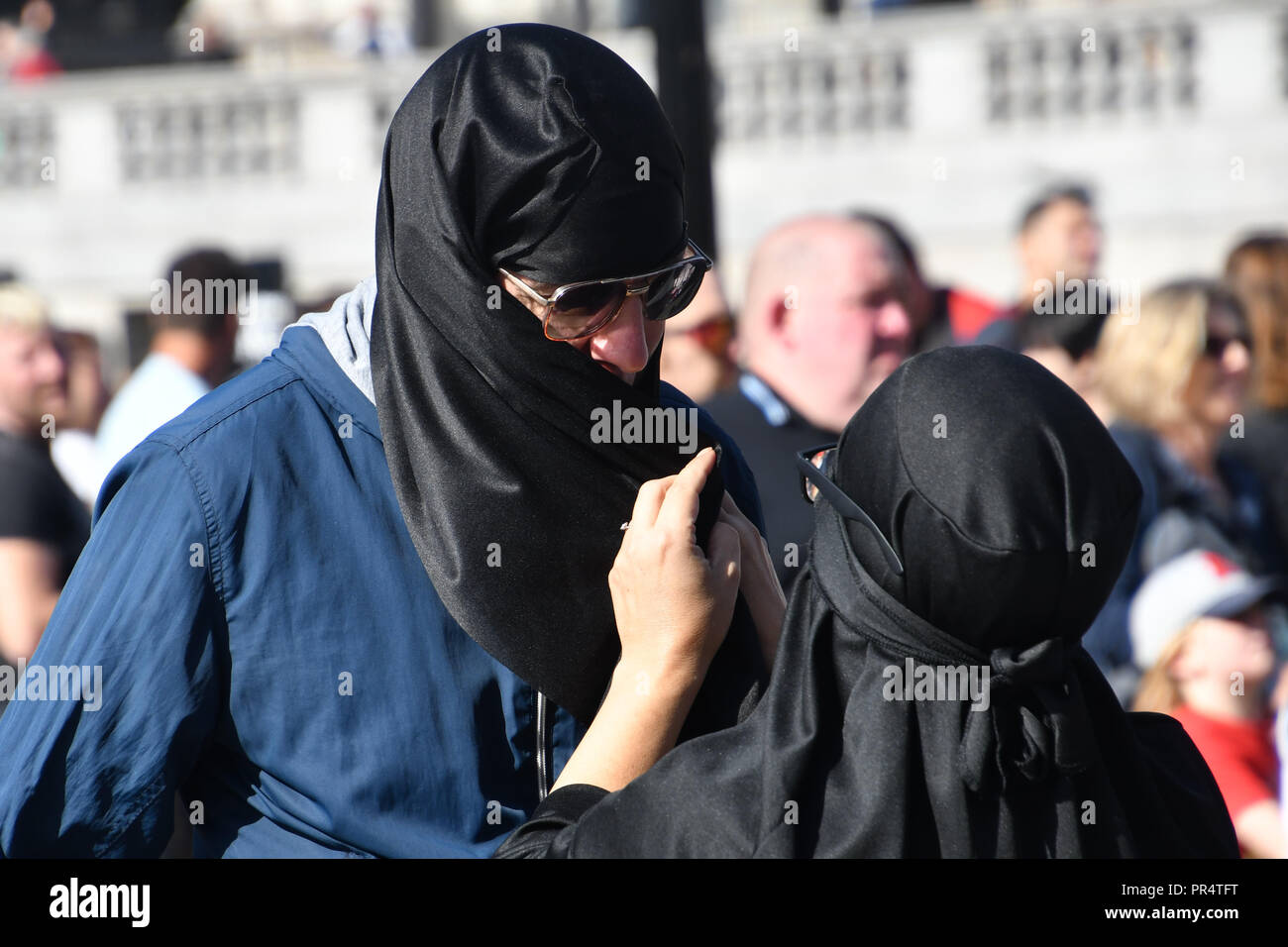 Group of white people wearing burka hi-res stock photography and images ...