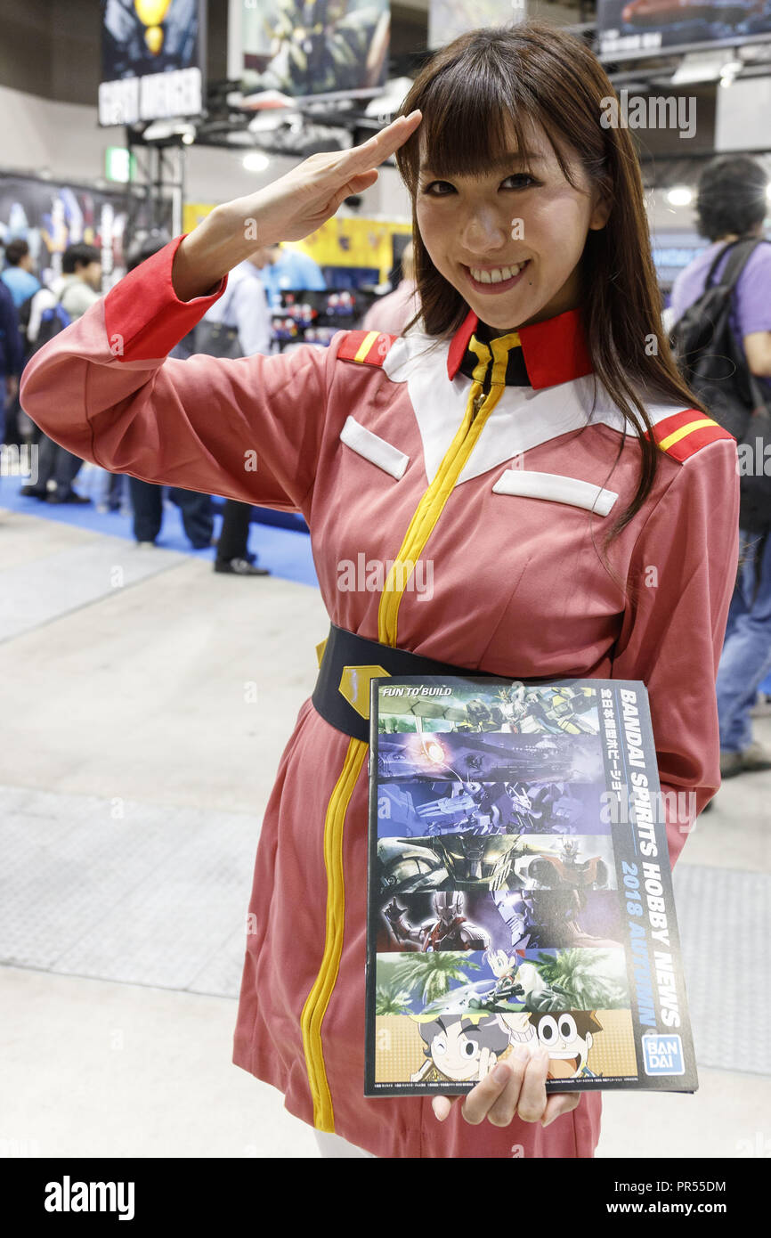 Tokyo, Japan. 29th Sep, 2018. A booth assistant poses for a photograph ...