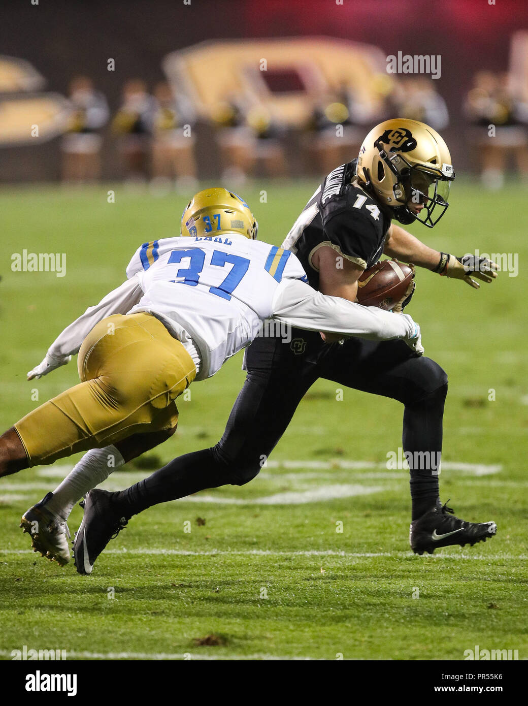 Boulder. 28th Sep, 2018. UCLA defensive back Quentin Lake tackles ...