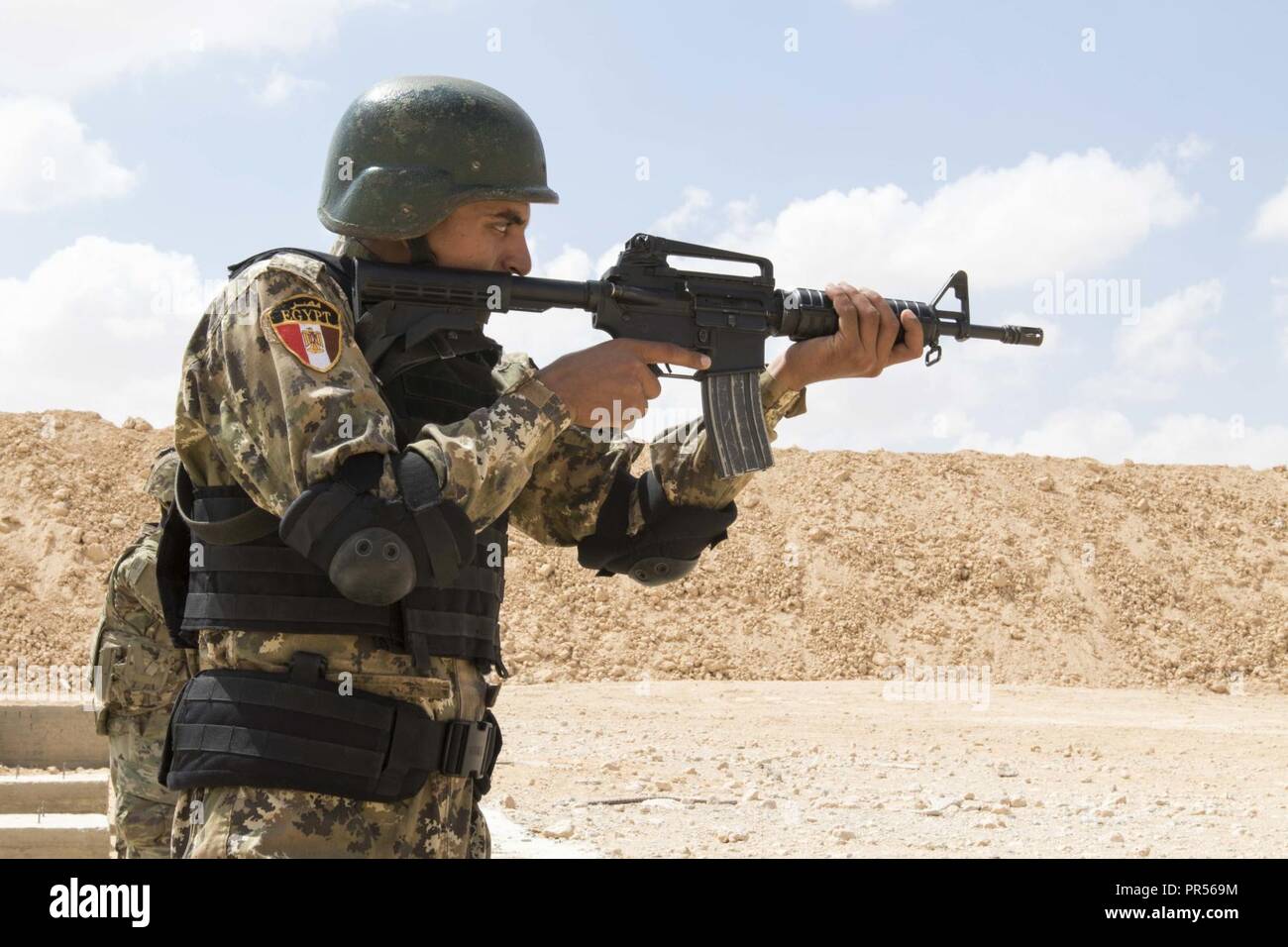 MOHAMED NAGUIB MILITARY BASE, Egypt – An Egyptian soldier conducts ...