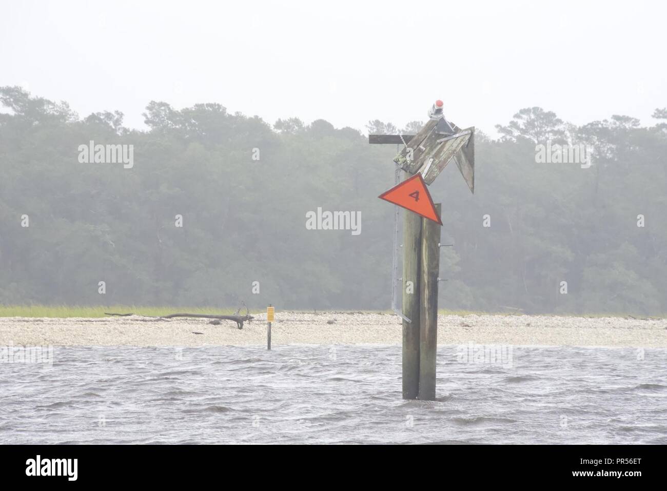 A damaged channel marker in the water in Horry County, South Carolina ...