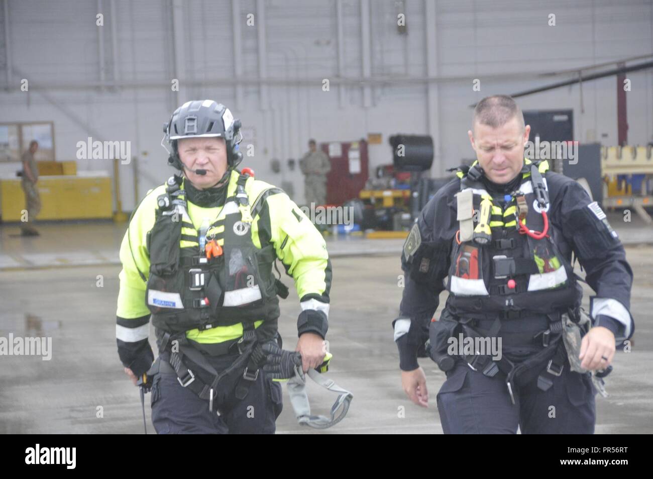 Members of the Pennsylvania Helicopter Aquatic Rescue Team prepare to ...
