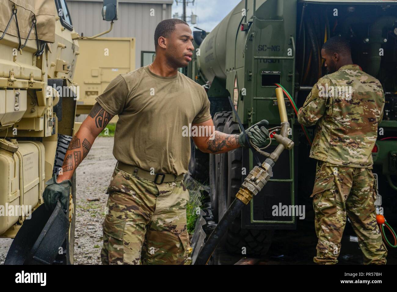 U.S. Army Spc. Devon Duncan and Sgt. Stephen Ellison assigned to the ...