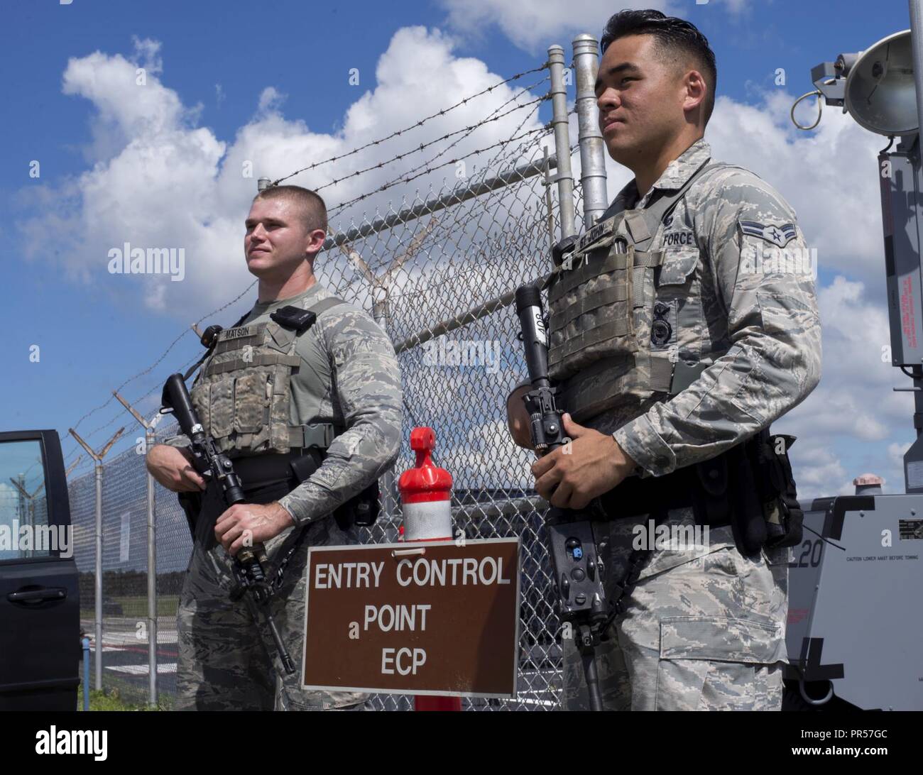 U.S. Air Force Senior Airman Timothy Matson, left, and Airman 1st Class ...