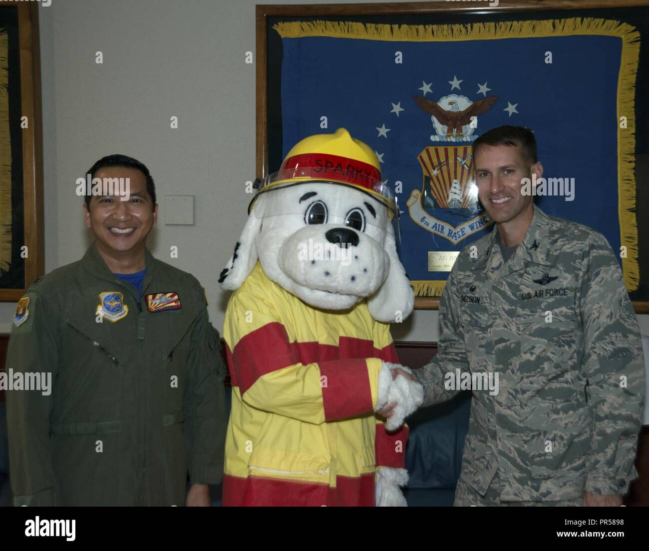 Col. Troy Pananon, 6th Air Mobility Wing Vice Commander, Sparky, the ...