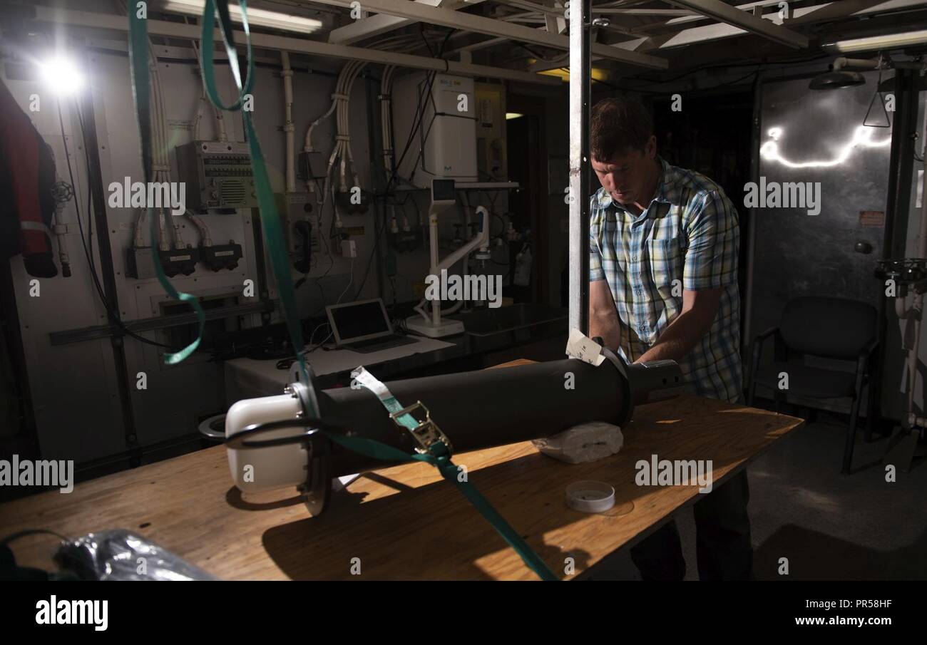 BERING SEA – Peter Koski prepares an ice tethered profiler for Arctic ...