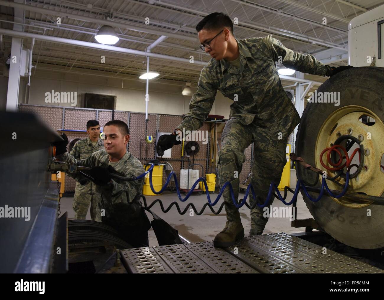 From left, Airman 1st Class Mathew Spencer, Senior Airman Eric Duffield ...