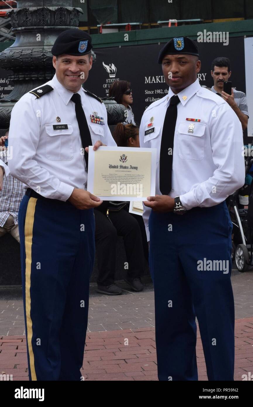 Spc. Robert S. Flores, 423rd Military Police Company based in Shoreham ...