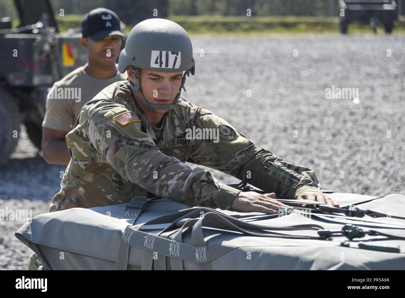 A U.S. Soldier assigned to 2nd Cavalry Regiment identifies preparation ...