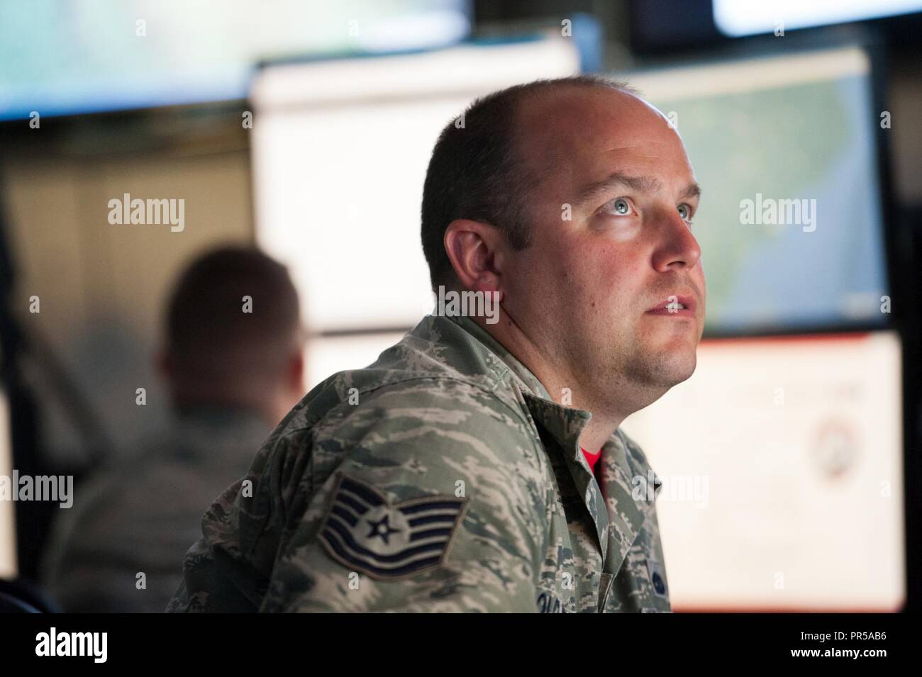 An Airman assigned to the 181st Intelligence Wing reviews imagery on ...