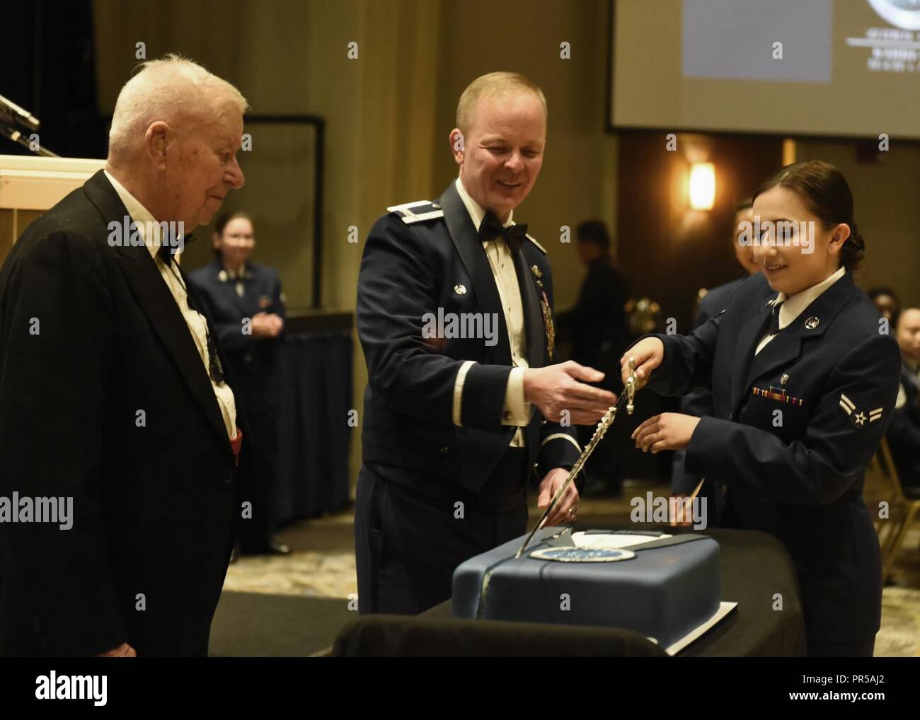Col. Derek Salmi, 92nd Air Refueling Wing commander, assists the ...