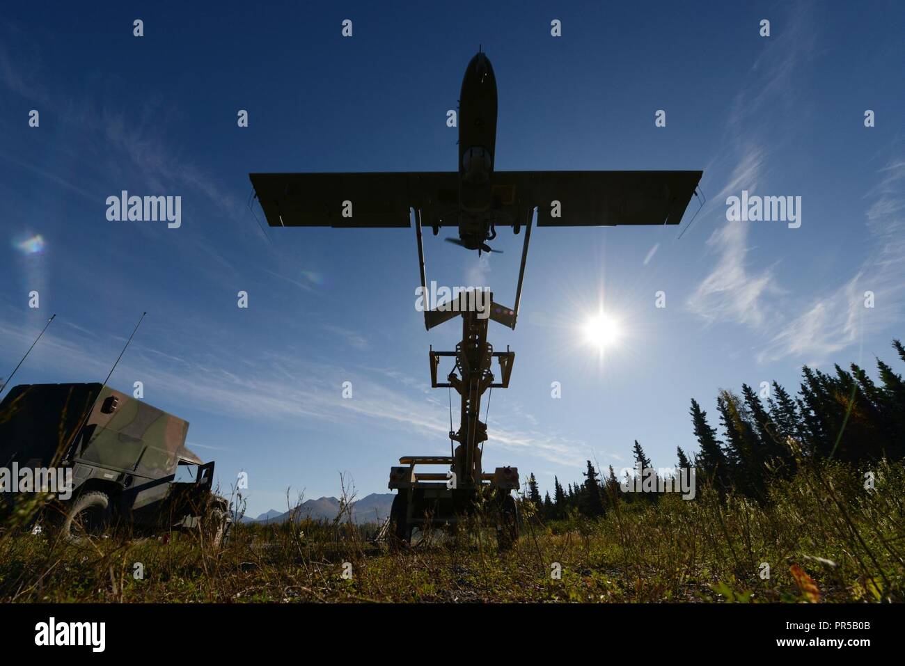 A U.S. Army RQ 7B Shadow 200 unmanned aerial vehicle is launched from a ...