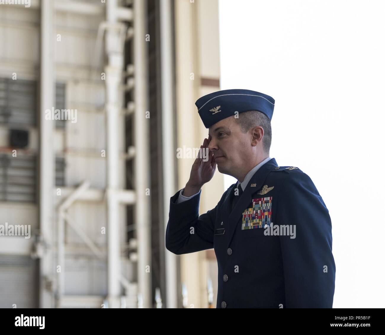 Col. Jeff Nelson, 60th Air Mobility Wing commander, renders his first ...