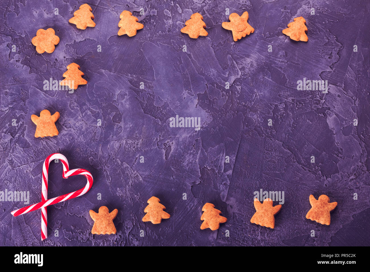 Traditional Christmas candies and biscuit biscuits on a dark concrete ...