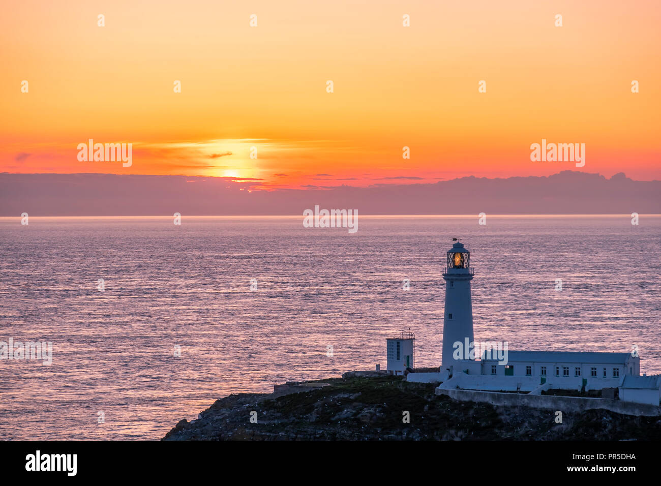 Sunset at south stack lighthouse on Anglesey in Wales - United Kingdom ...