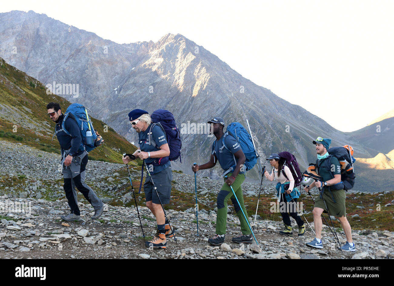 Sir Richard Branson (second left), his son Sam Branson (right) and ...