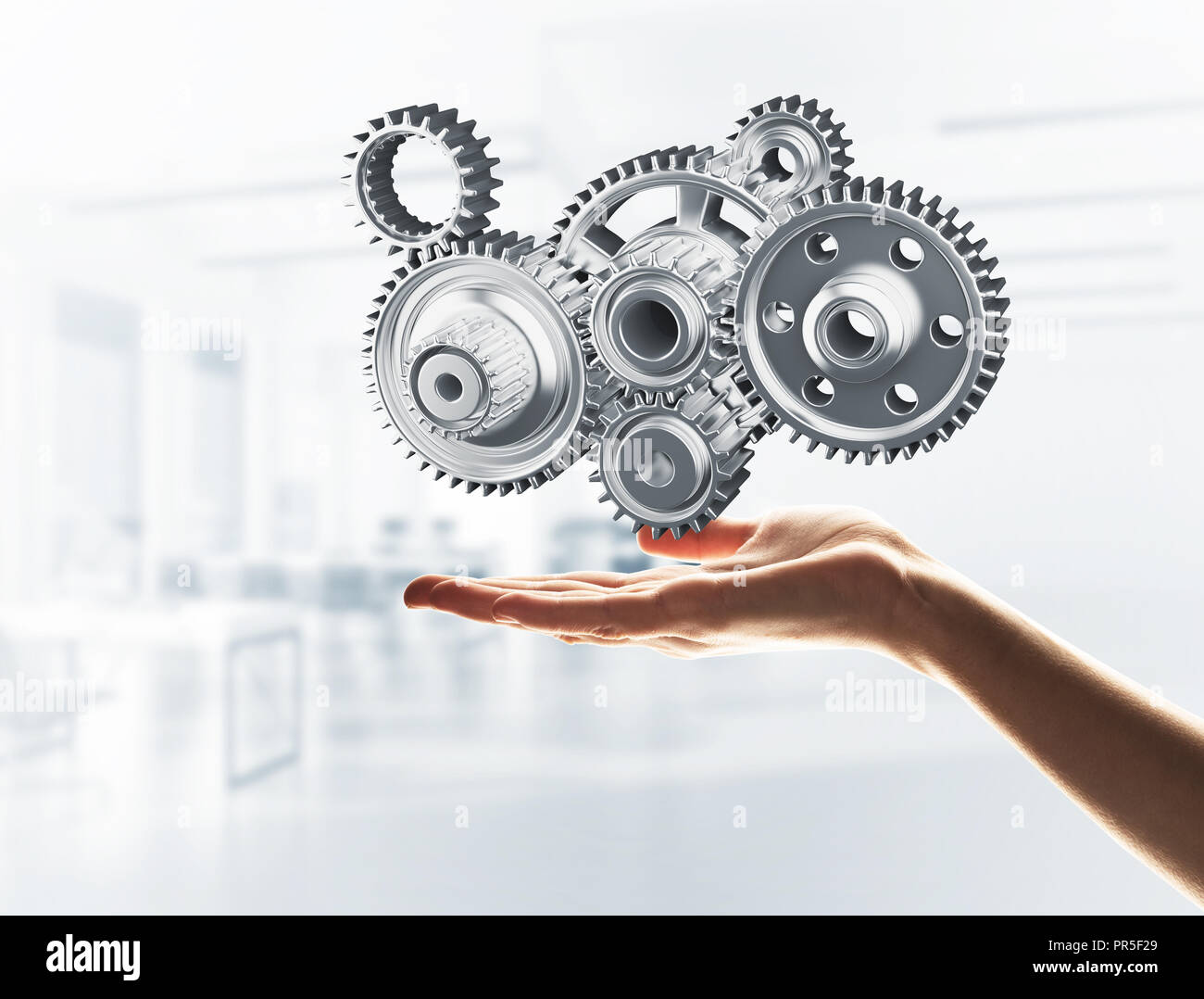 Concept of teamwork and cooperation presented with working gear engine ...