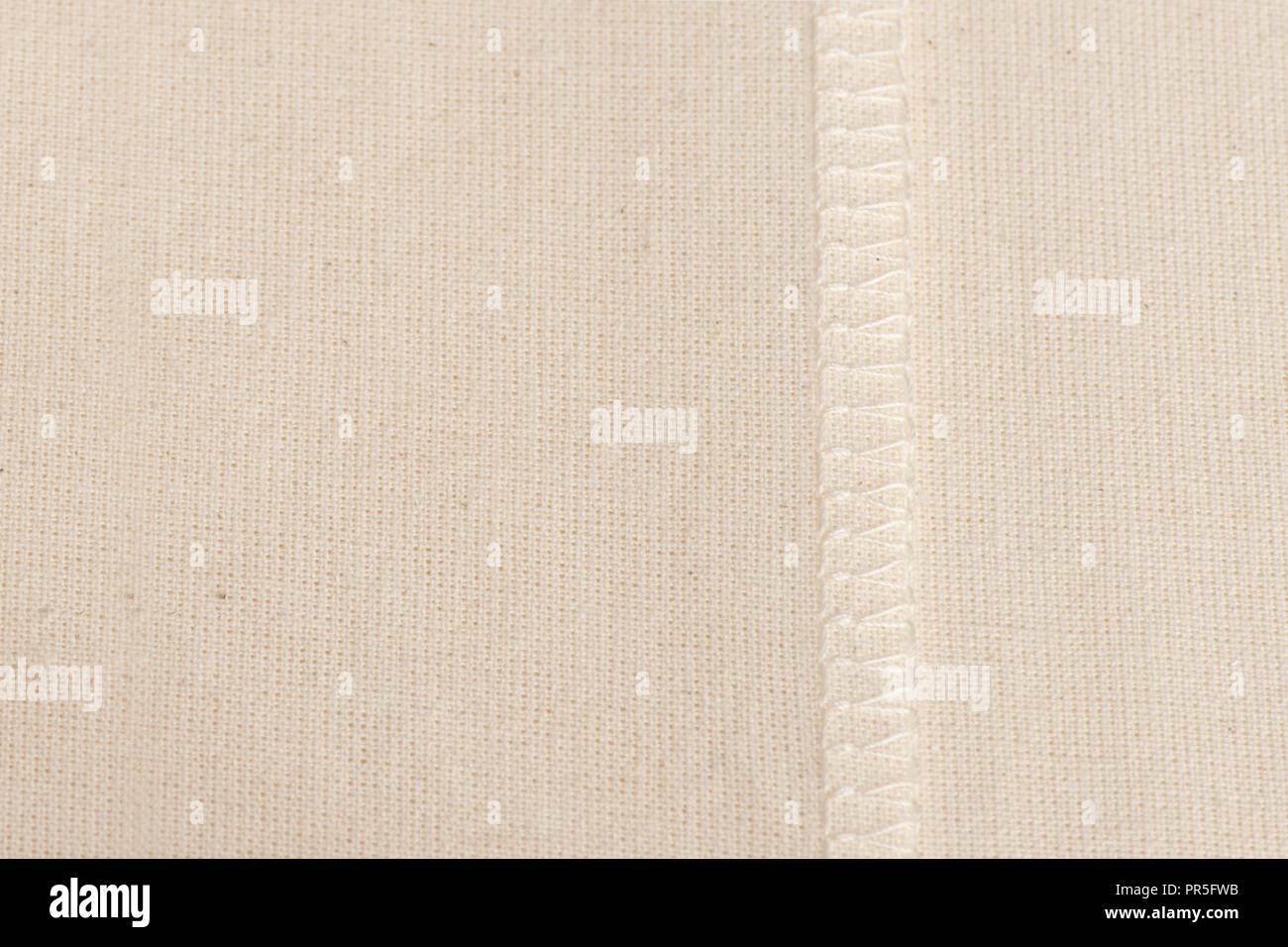 inner sewing seam on white linen cloth, as background Stock Photo - Alamy