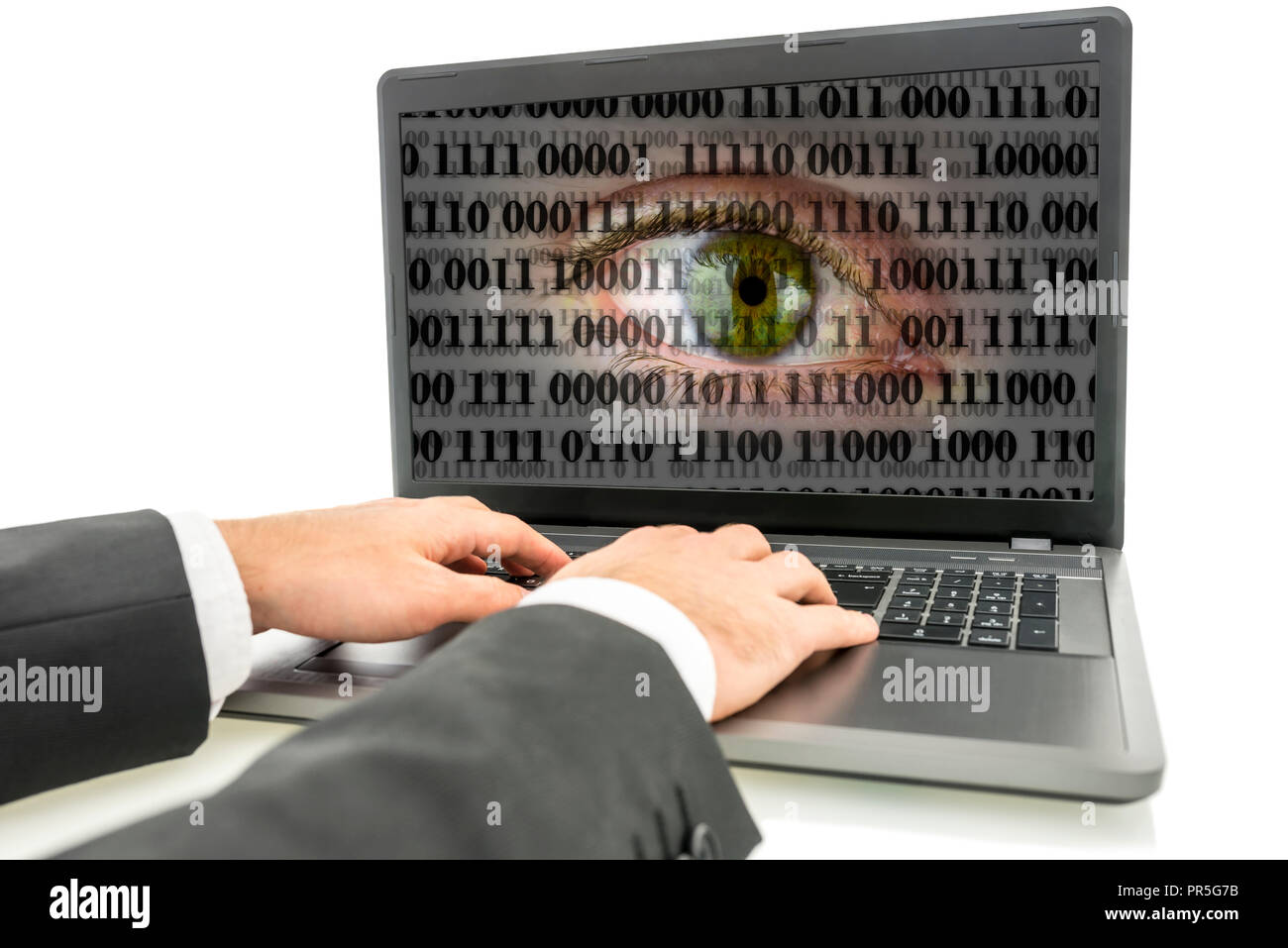Hacker working on laptop with human eye with digital binary code on ...