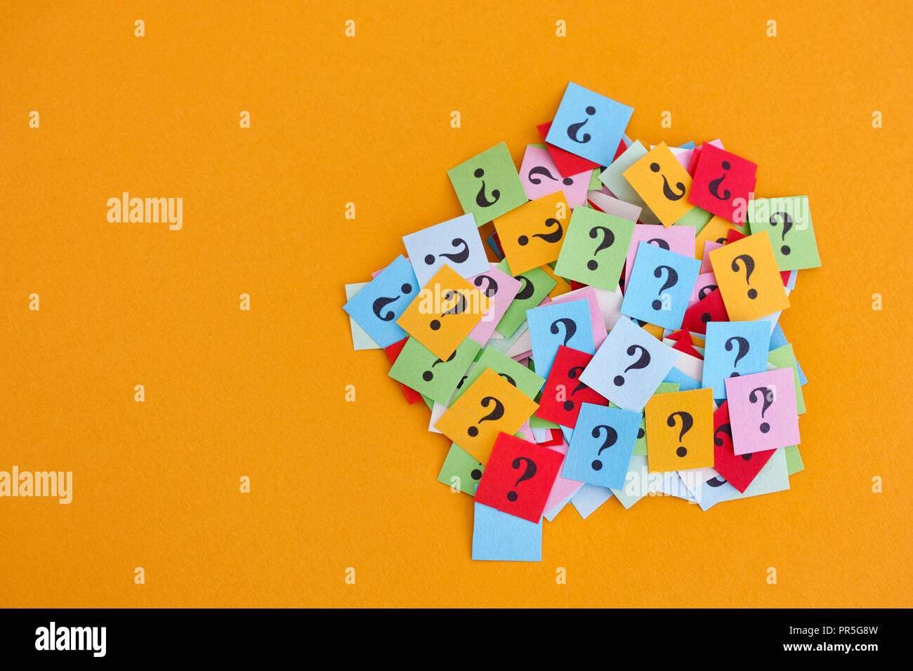 Too Many Questions. Pile of colorful paper notes with question marks on ...