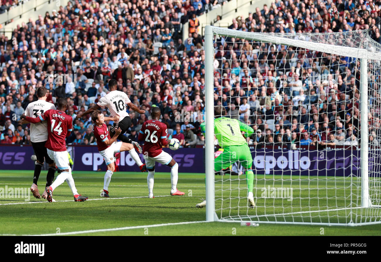 Manchester United's Marcus Rashford scores his side's first goal of the ...
