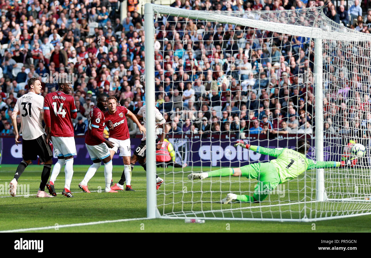 Manchester United's Marcus Rashford scores his side's first goal of the ...
