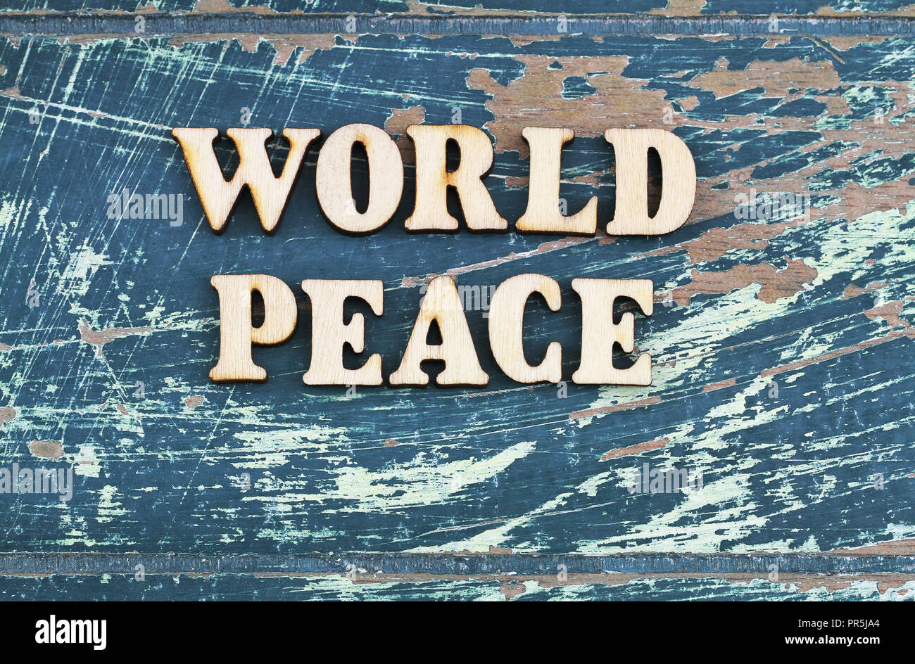 World peace written with wooden letters on rustic surface Stock Photo ...