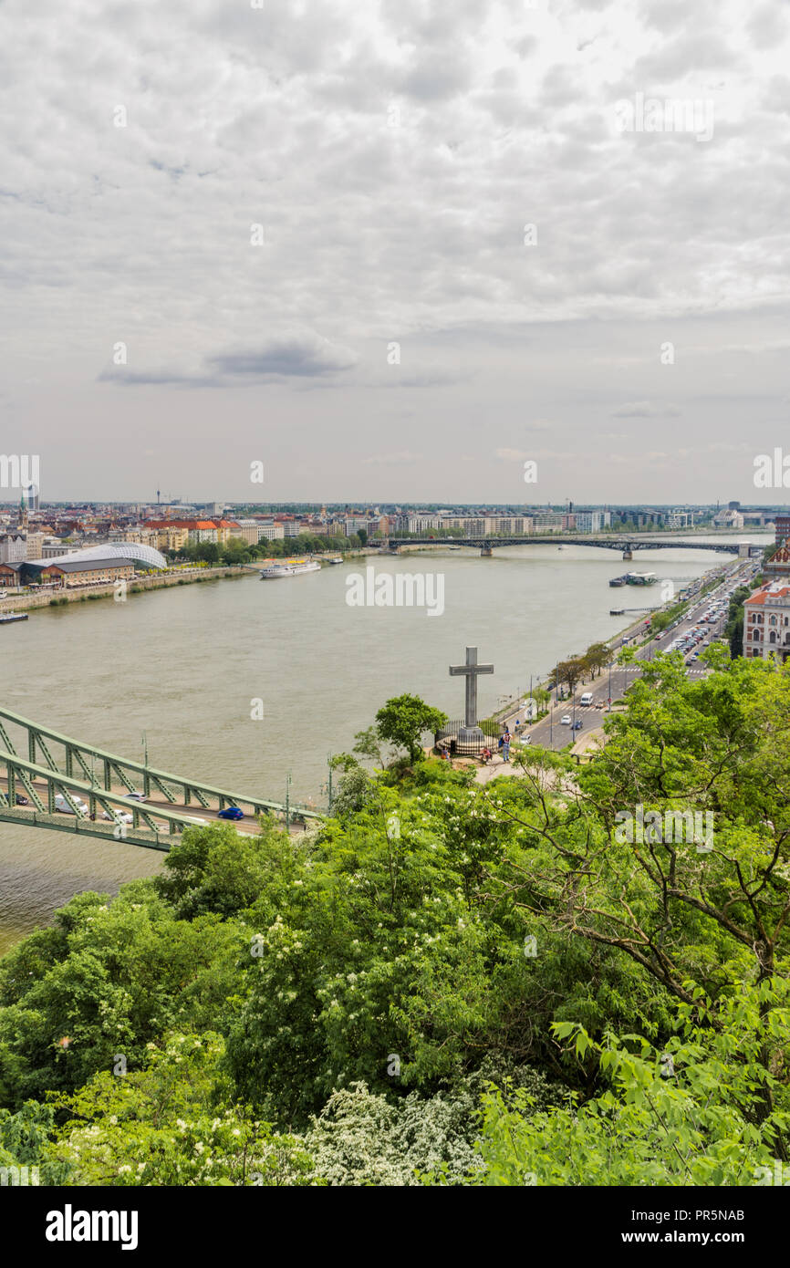 Budapest, Hungary – April 24 Stone cross on Gellert Hill with the River ...
