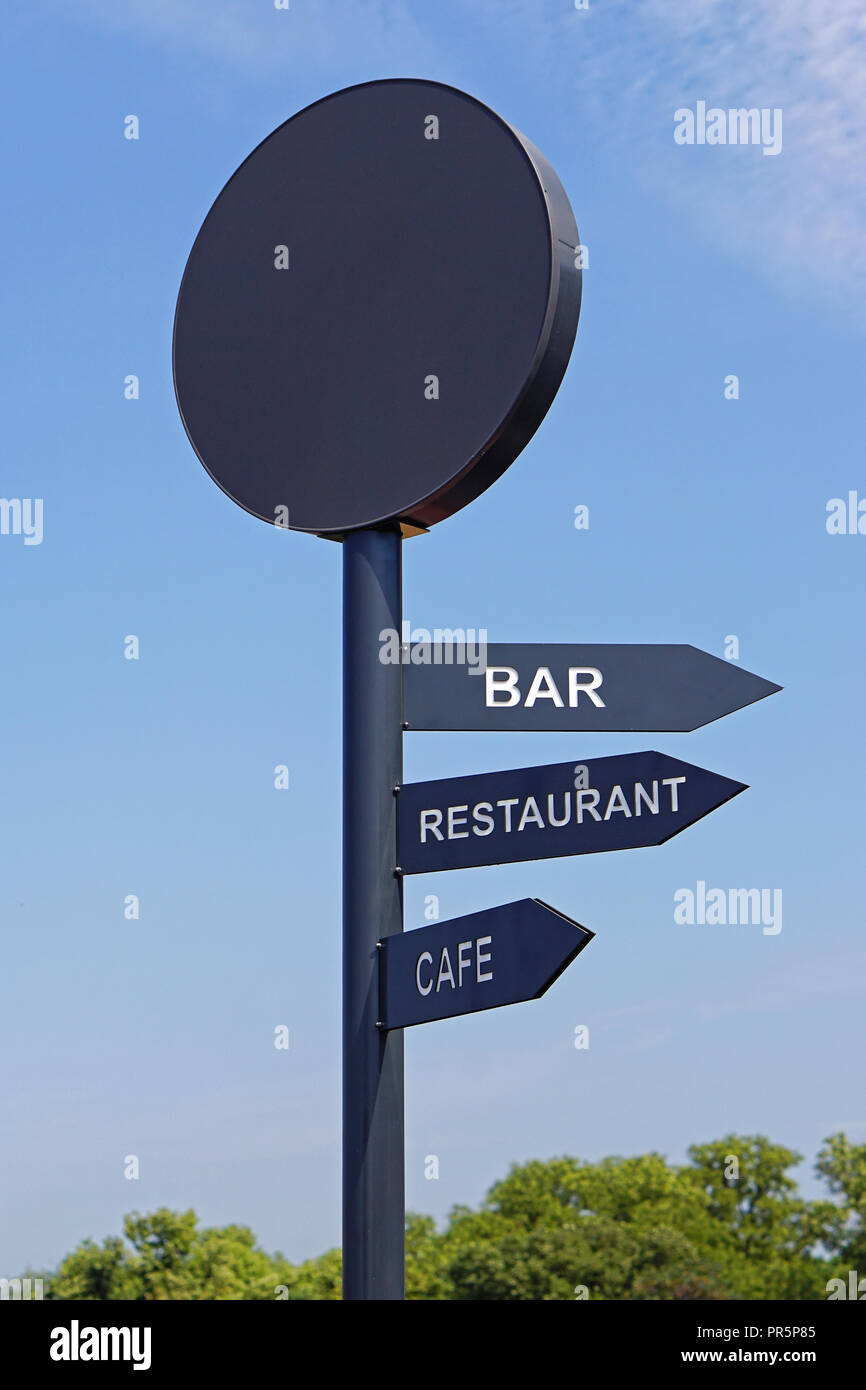 Black sign post for bar restaurant and cafe direction Stock Photo - Alamy